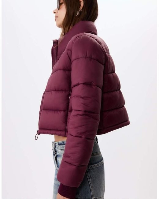 Stradivarius High Neck Puffer Jacket in Red | Lyst UK