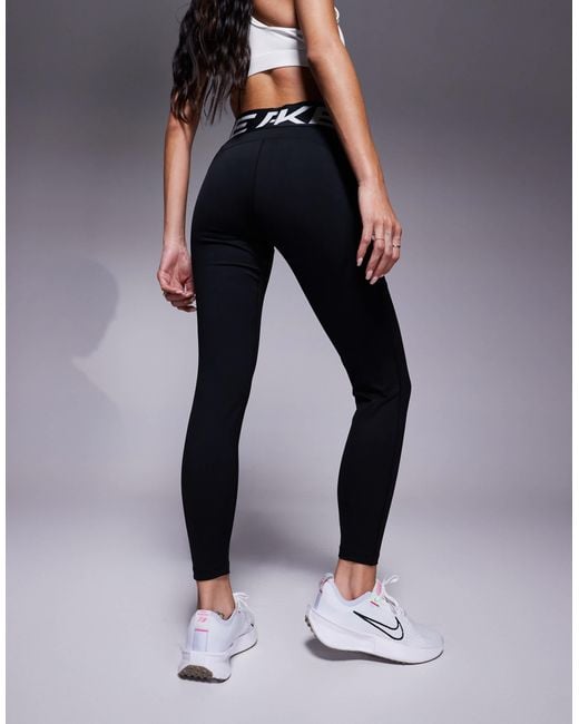 Nike Pro Sculpt High Waisted 7/8 leggings in Gray | Lyst