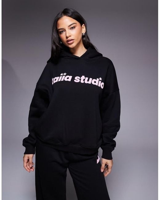 Kaiia Studio Star Logo Oversized Hoodie in Blue | Lyst UK