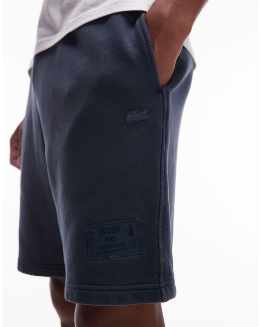 Short - surteint Lacoste pour homme en coloris Blanc | Lyst