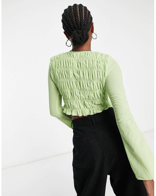 The Frolic Exclusive Shirred Fluted Sleeve Crop Blouse in Green | Lyst