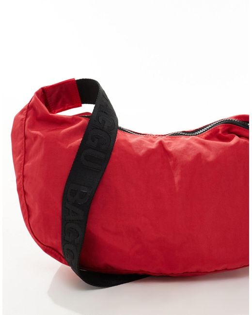 BAGGU Medium Nylon Crescent Crossbody Bag in Red | Lyst UK