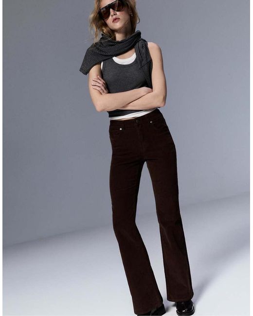 Stradivarius D74 Corduroy Bell Bottom Trousers in Black | Lyst UK