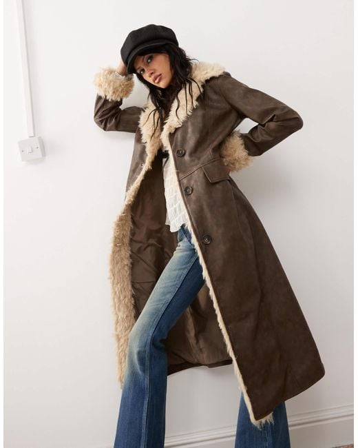 Reclaimed (vintage) Longline Leather Look Coat With Faux Fur Trims in Brown | Lyst