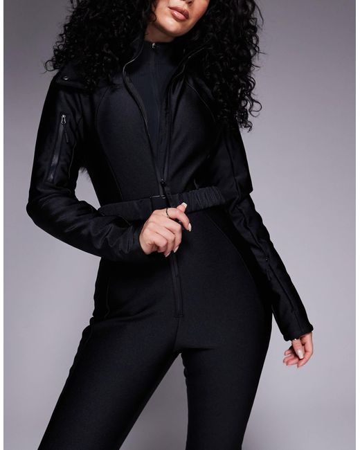 ASOS 4505 Ski & Snow 4505 Hourglass Ski Belted Ski Suit With Slim Kick Leg And Faux Fur Hood in ...