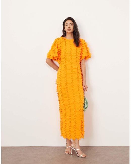 ARRANGE Laser Cut Flutter Sleeve Maxi Dress in Orange | Lyst Australia