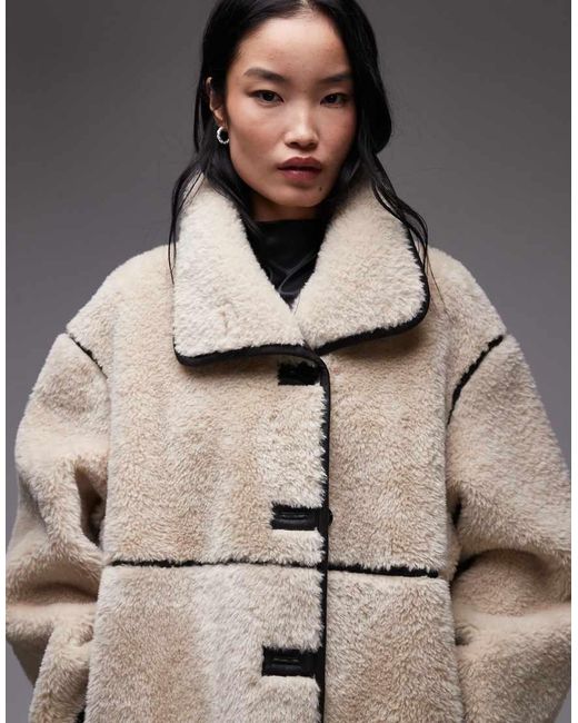 ARKET Oversized Faux Shearling Midi Coat With Brown Contrast Edging in ...