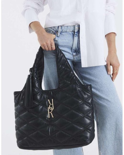 River Island Oversized Quilted Rr Tassel Slouch Bag in Black | Lyst UK
