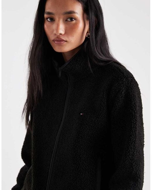 Tommy Hilfiger Flag Logo Teddy Zip Up Coat in Black | Lyst UK