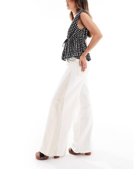 ASOS Flared Jeans With Two-tone Panels in White | Lyst