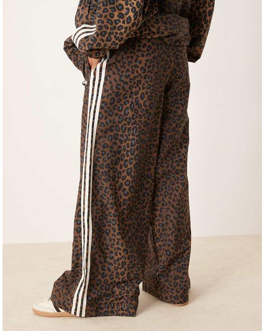 adidas Originals Leopard Firebird Oversized Track Pants in Natural ...