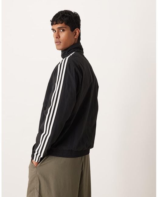 adidas Originals Firebird Woven Track Top in Black | Lyst UK