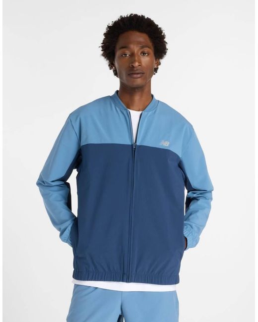 New Balance Stretch Bomber Jacket in Blue for Men | Lyst UK
