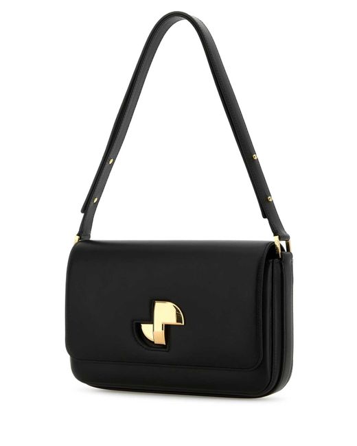 Patou Leather Le Classic Lock Shoulder Bag in Black for Men | Lyst