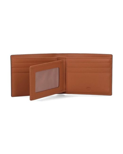 MCM Wallets in White for Men | Lyst