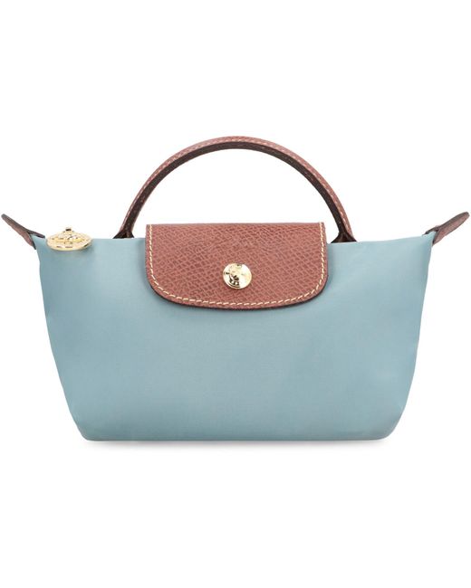 Longchamp Le Pliage Original Clutch in Blue | Lyst