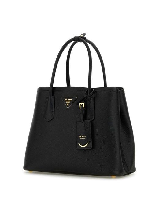 Prada Handbags in Black | Lyst