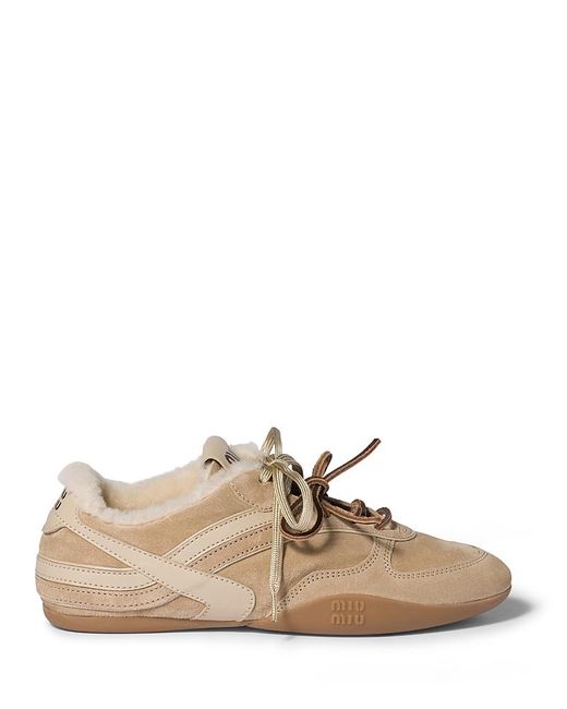 Miu Miu Shearling Lined Low Top Sneakers in Natural | Lyst UK