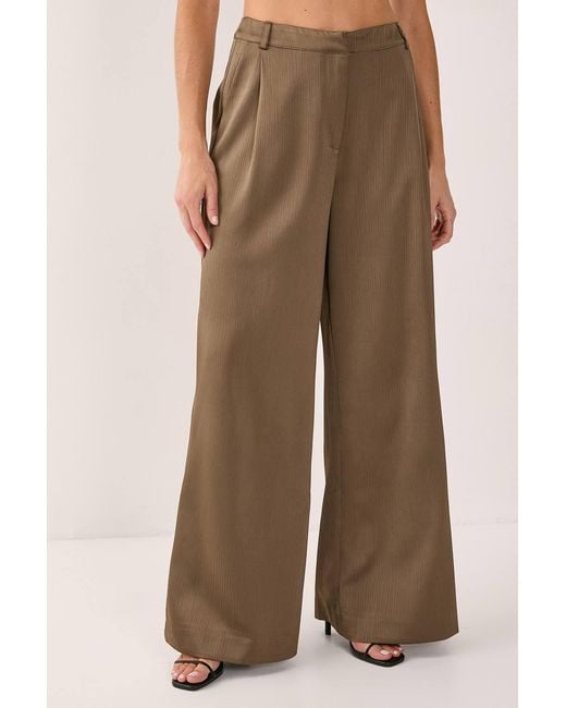 Nasty Gal Satin Pleated Tailored Pants in Natural | Lyst
