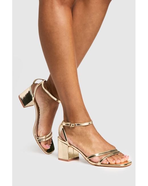 Boohoo Metallic Low Block Asymmetric Barely There Heels in Natural | Lyst