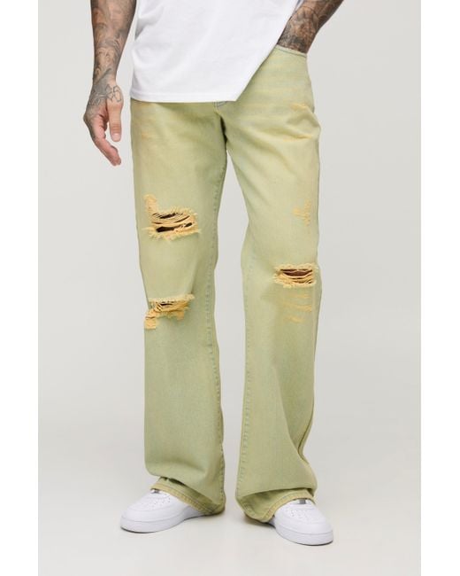 BoohooMAN Tall Relaxed Rigid Flare Stacked Knee Rip Denim Jeans in ...