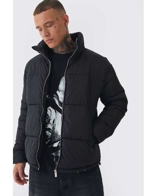 BoohooMAN Tall Worldwide Applique Funnel Neck Puffer Jacket In Black in ...