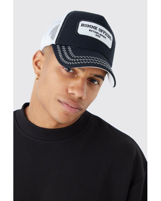 BoohooMAN Homme Badge Contrast Stitch Trucker Cap in Black for Men ...