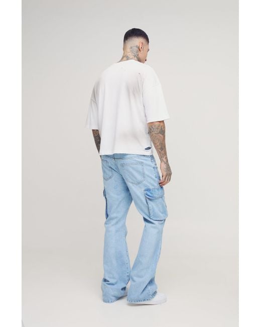 BoohooMAN Tall Relaxed Rigid Flare Cargo Jeans in Blue for Men | Lyst
