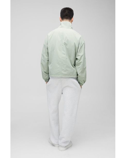 BoohooMAN Oversized Boxy Crinkle Nylon Combat Track Jacket in Green for ...