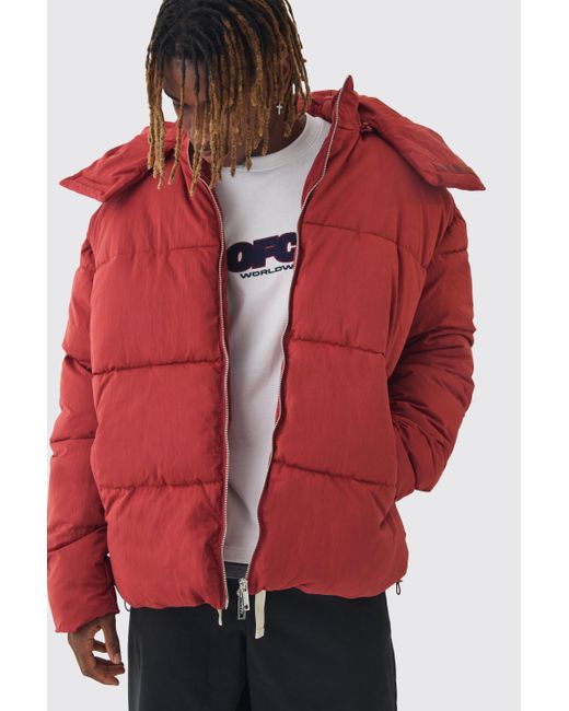 BoohooMAN Tall Extended Funnel Neck Hooded Puffer Jacket In Rust in Red ...