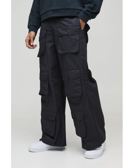 BoohooMAN Super Baggy Ripstop Multi Pocket Cargo Pants in Black for Men ...