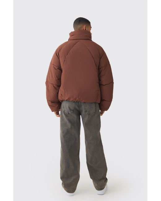 BoohooMAN Boxy Fit Drawcord Quilted Funnel Neck Puffer Coat In ...