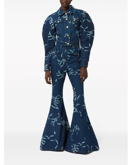 Nina Ricci Bow-Print Flared Jeans in Blue | Lyst