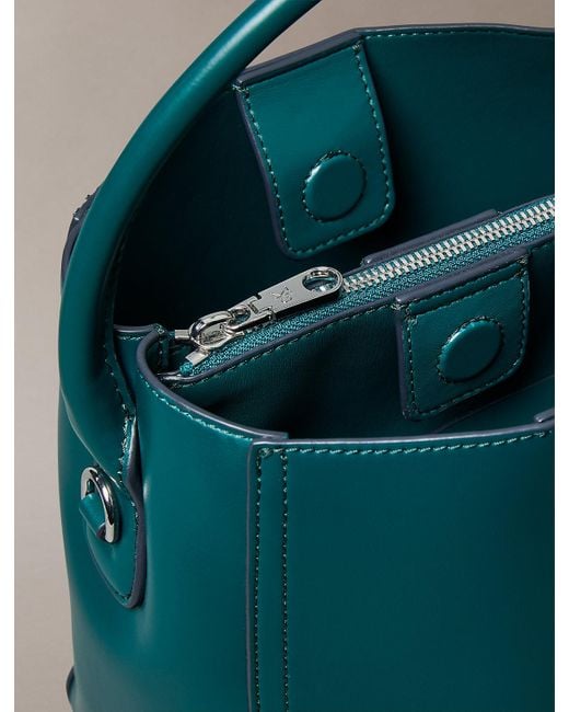 Calvin Klein Monogram Logo Hardware Bucket Bag in Green | Lyst UK