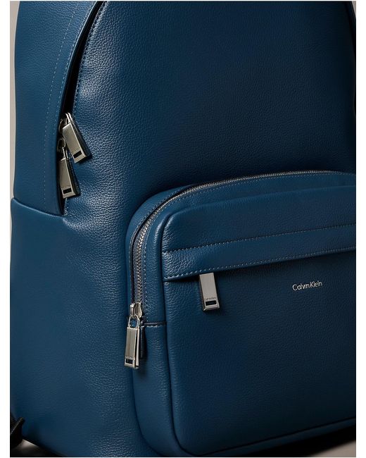 Calvin Klein Raised Logo Round Backpack in Blue for Men | Lyst