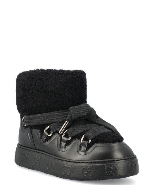 Gucci Faux-Shearling Round Toe Ankle Boots in Black | Lyst