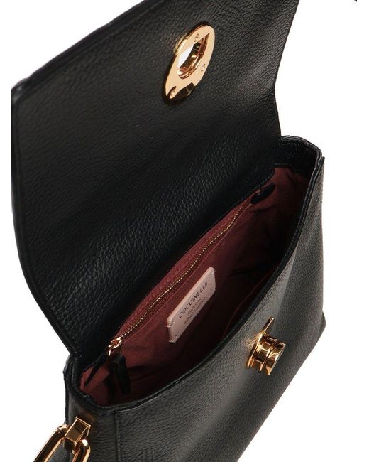 Coccinelle Liya Logo Engraved Crossbody Bag in Black | Lyst