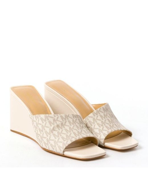MICHAEL Michael Kors Merriam Signature Logo Wedge Sandals in Natural | Lyst