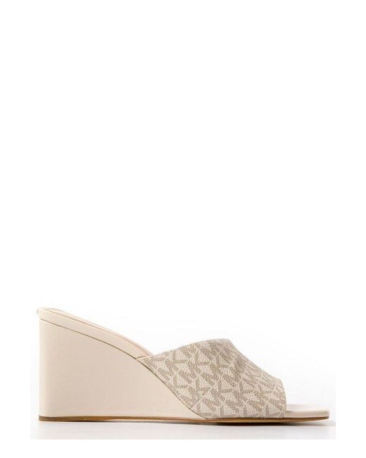 MICHAEL Michael Kors Merriam Signature Logo Wedge Sandals in Natural | Lyst