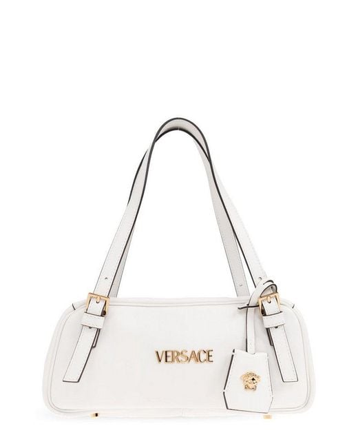 Versace Logo-Lettering Zipped Shoulder Bag in Natural | Lyst