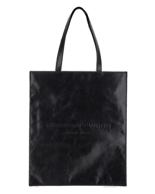 Alexander Wang Logo Embossed Large Pinch Tote Bag in Black | Lyst