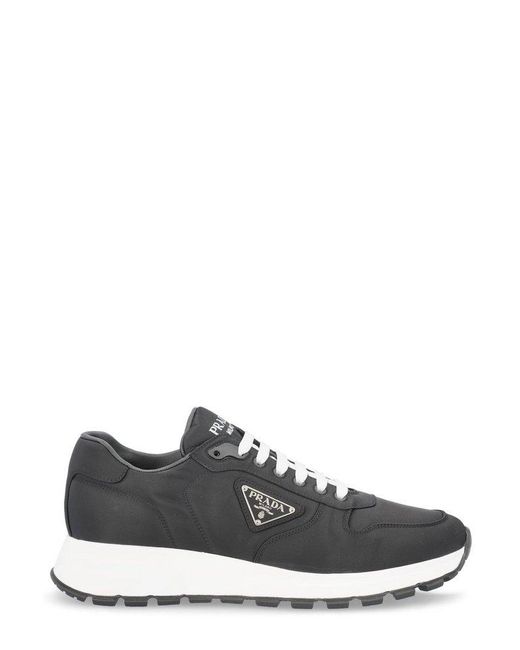 Prada Logo Plaque Lace Up Sneakers In Black For Men Lyst
