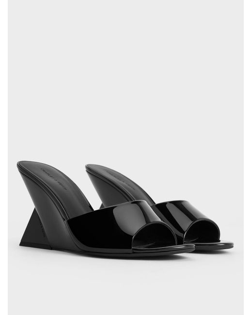 Charles & Keith Patent Triangle-heel Wedge Mules in Black | Lyst
