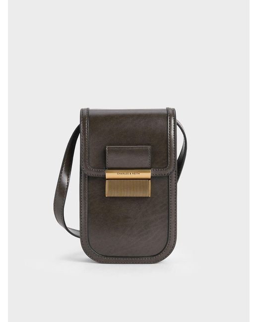 Charles & Keith Mini Charlot Elongated Crossbody Bag in Black | Lyst