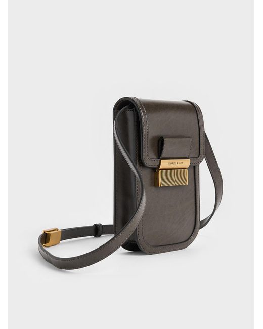 Charles & Keith Mini Charlot Elongated Crossbody Bag in Black | Lyst