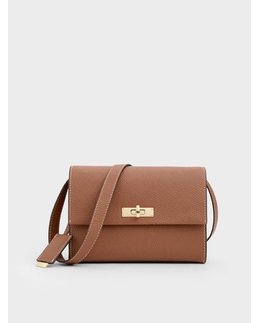 Charles & Keith Chance Recycled Leather Turn-Lock Crossbody Bag in ...