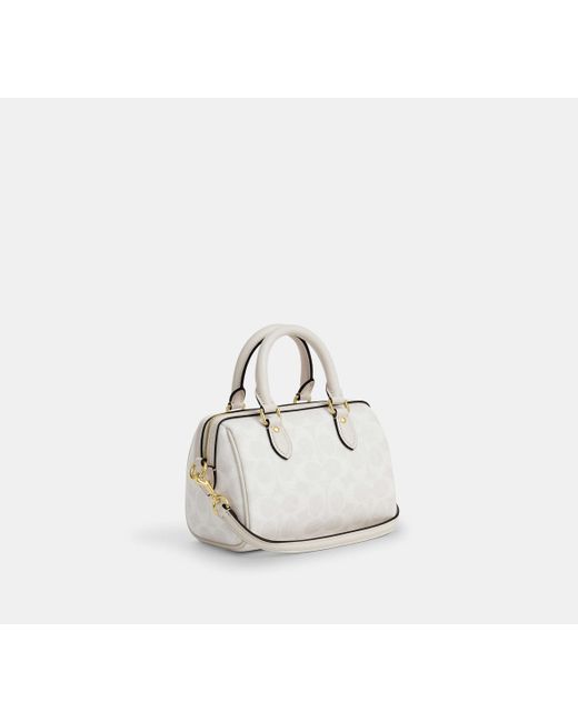 COACH Mini Rowan Crossbody Bag In Signature Canvas in Black | Lyst UK