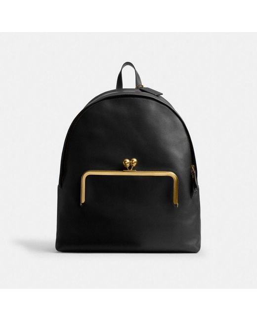 COACH Kisslock Frame Backpack in Black | Lyst