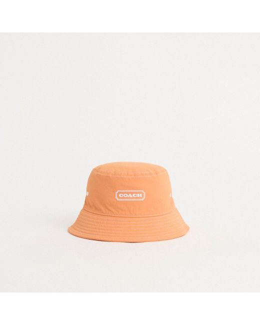 COACH Restored Bucket Hat With Badge in Orange | Lyst