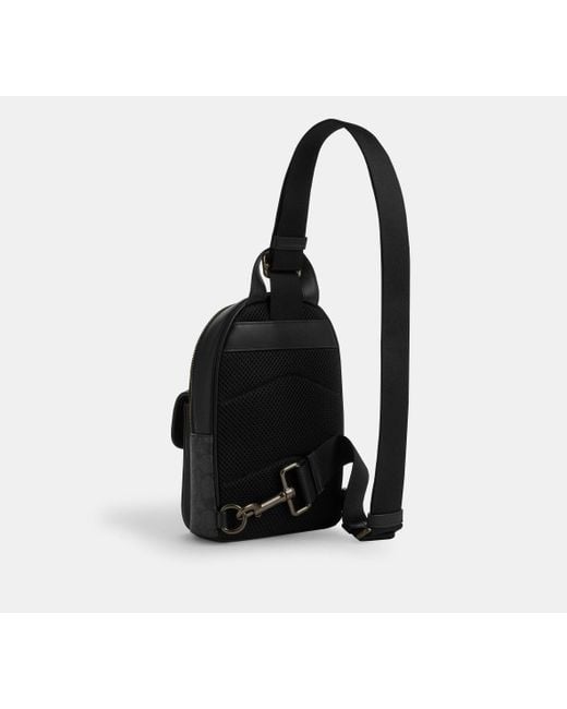 COACH Small Turnlock Sling Pack in Black for Men | Lyst UK